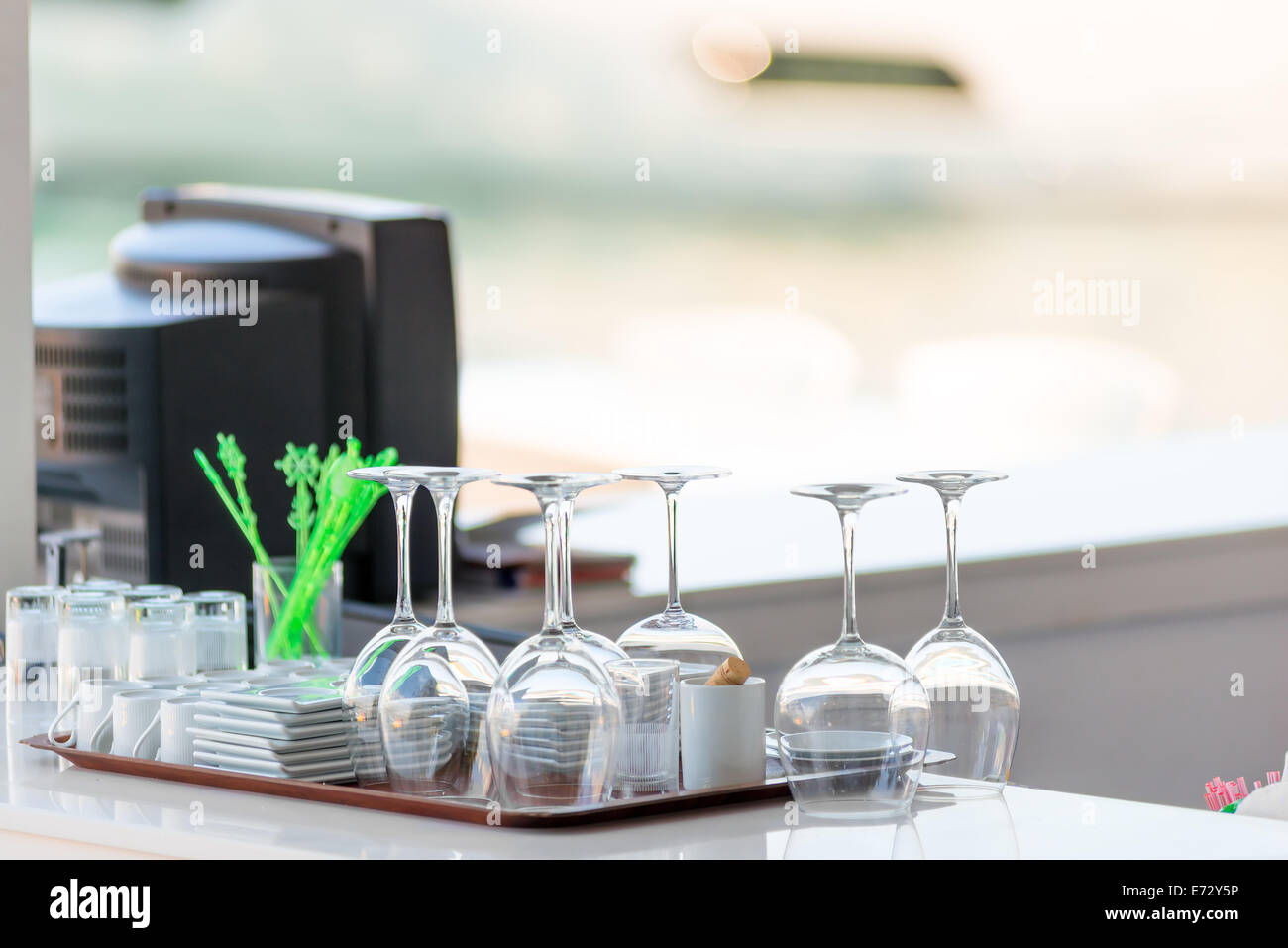 clean dishes on the bar in a summer cafe Stock Photo - Alamy