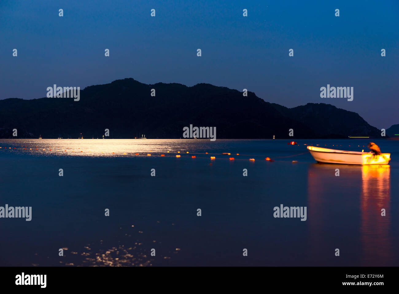 fishing boat in the night a calm sea Stock Photo - Alamy