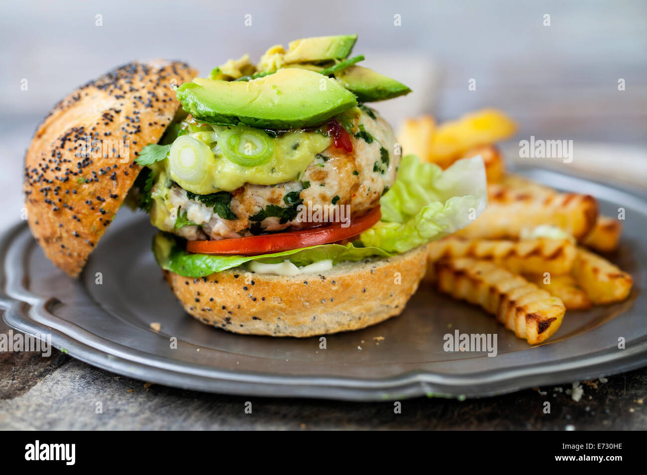 Turkey burger with avocado Stock Photo - Alamy