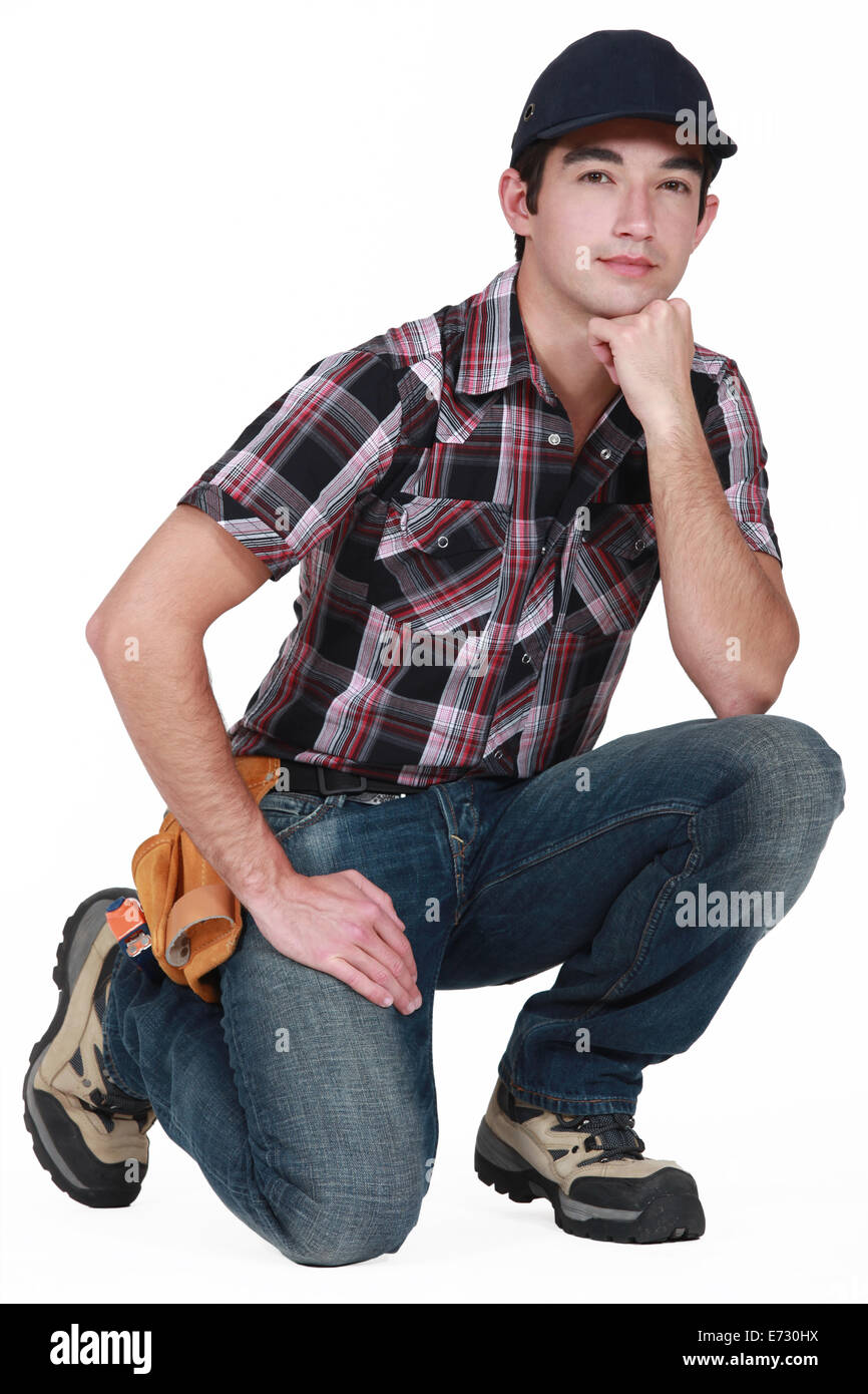 Craftsman wearing cap Stock Photo - Alamy