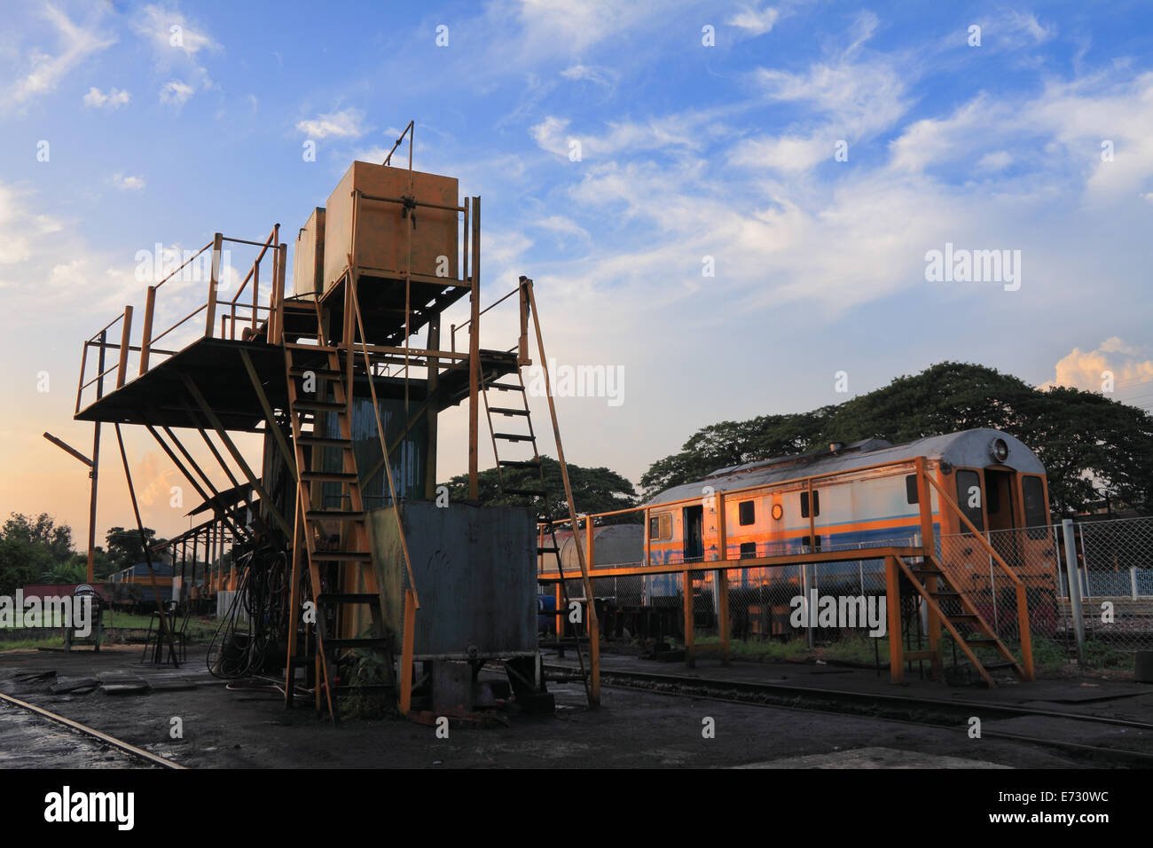 landscape old locomotive repair plant before sunset Stock Photo - Alamy