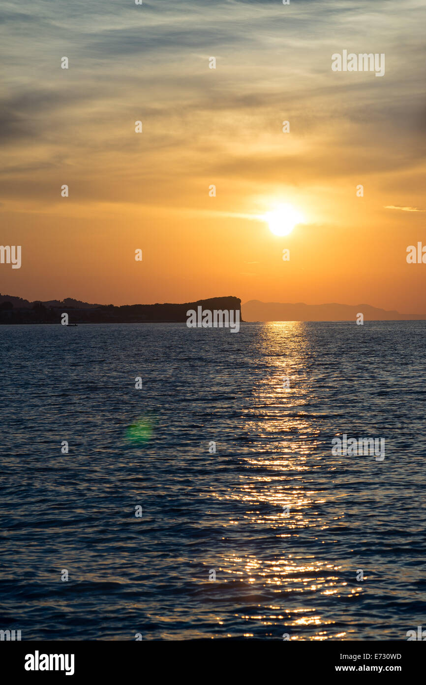 Sunset over Roda Corfu Stock Photo - Alamy