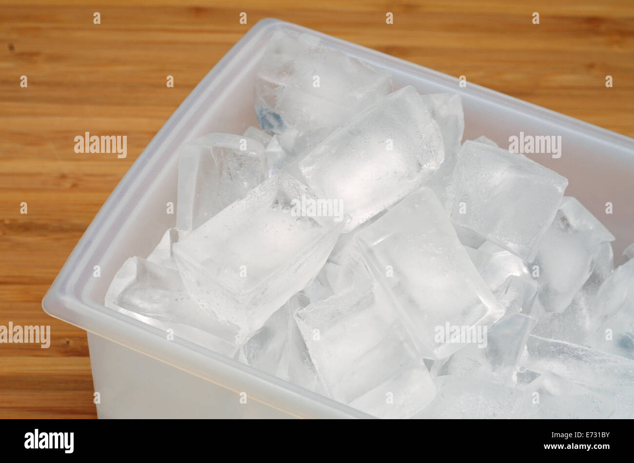 ice cubes in a plastic tray Stock Photo - Alamy