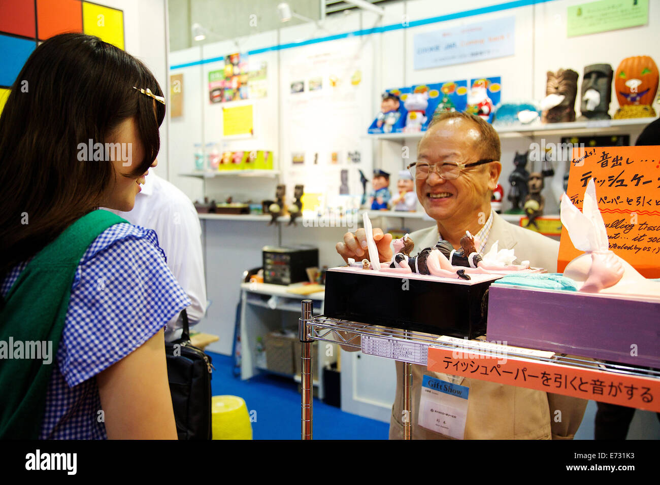 Exhibitor shows to visitor an original tissue box during the Gift Show ...