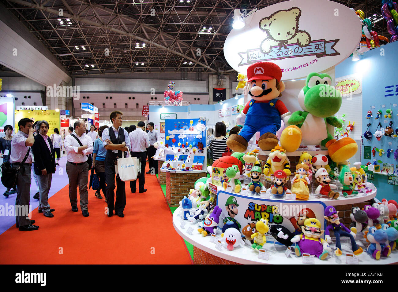 Visitors walk between halls at the Gift Show exhibition in Tokyo Big ...