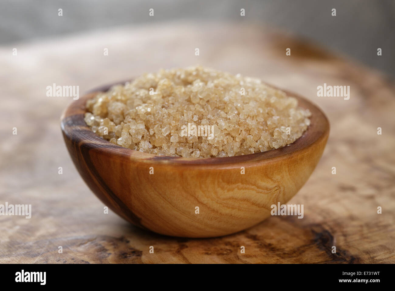 brown sugar in wood bowl, close up photo Stock Photo - Alamy