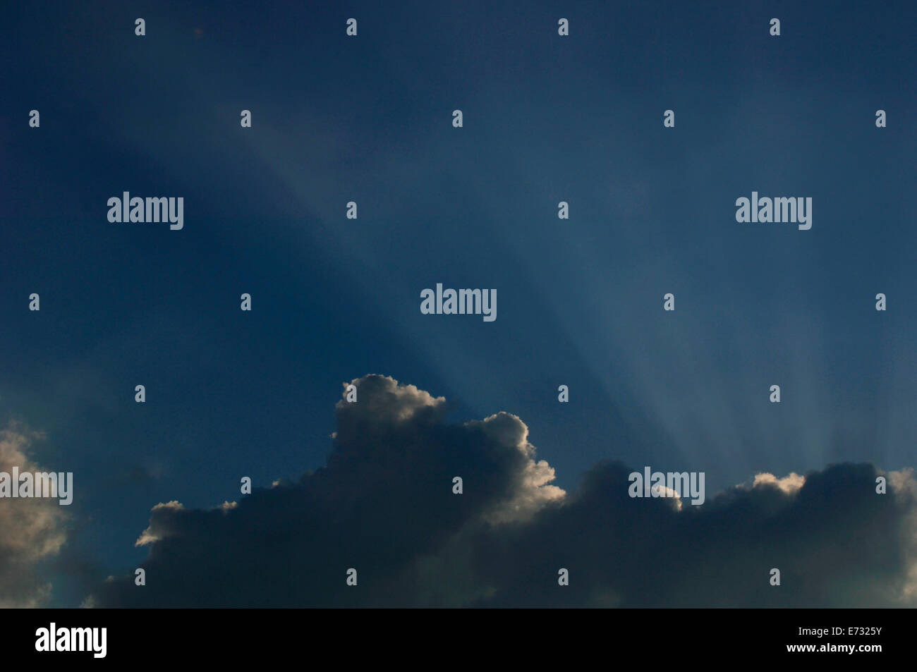 Sunbeams Breaking From A Cloud Stock Photo - Alamy
