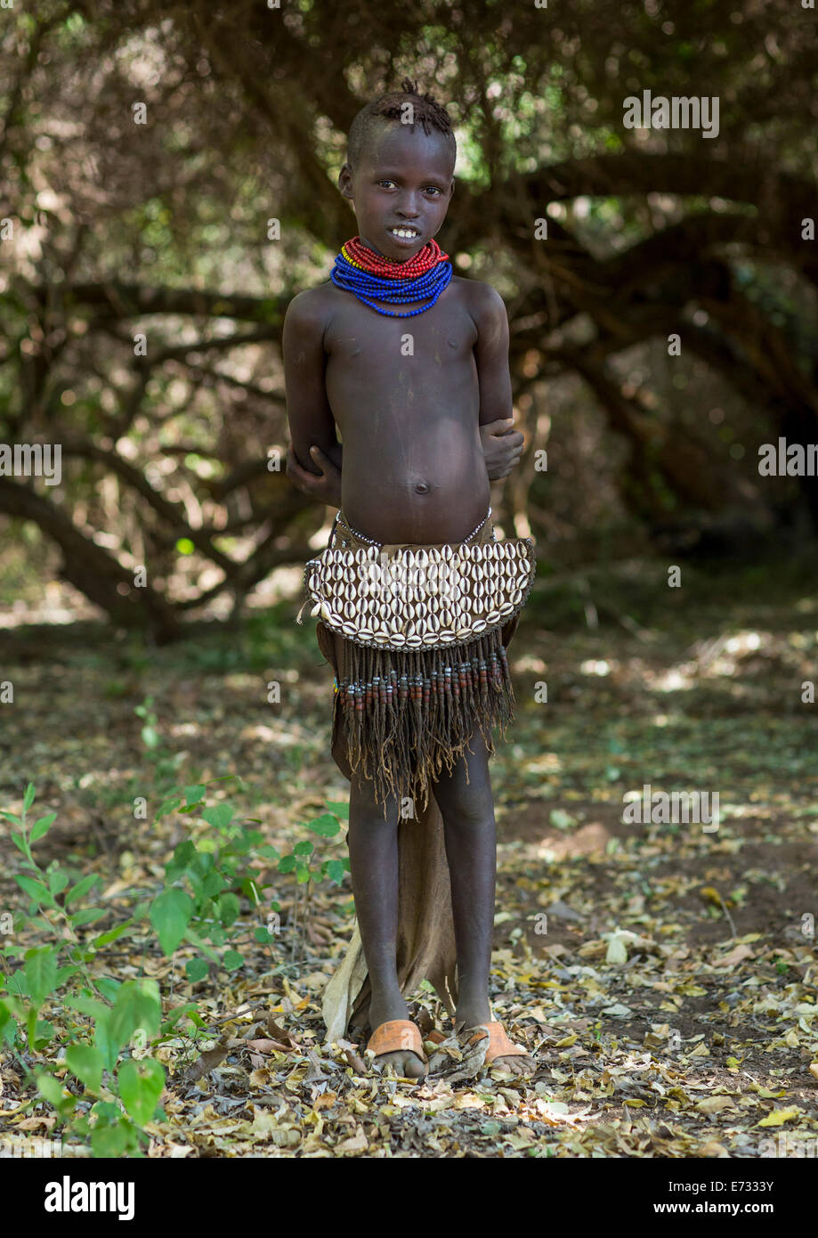 Portrait Of A Nyangatom Tribe Girl With A Traditional Skirt, Omo Valley ...