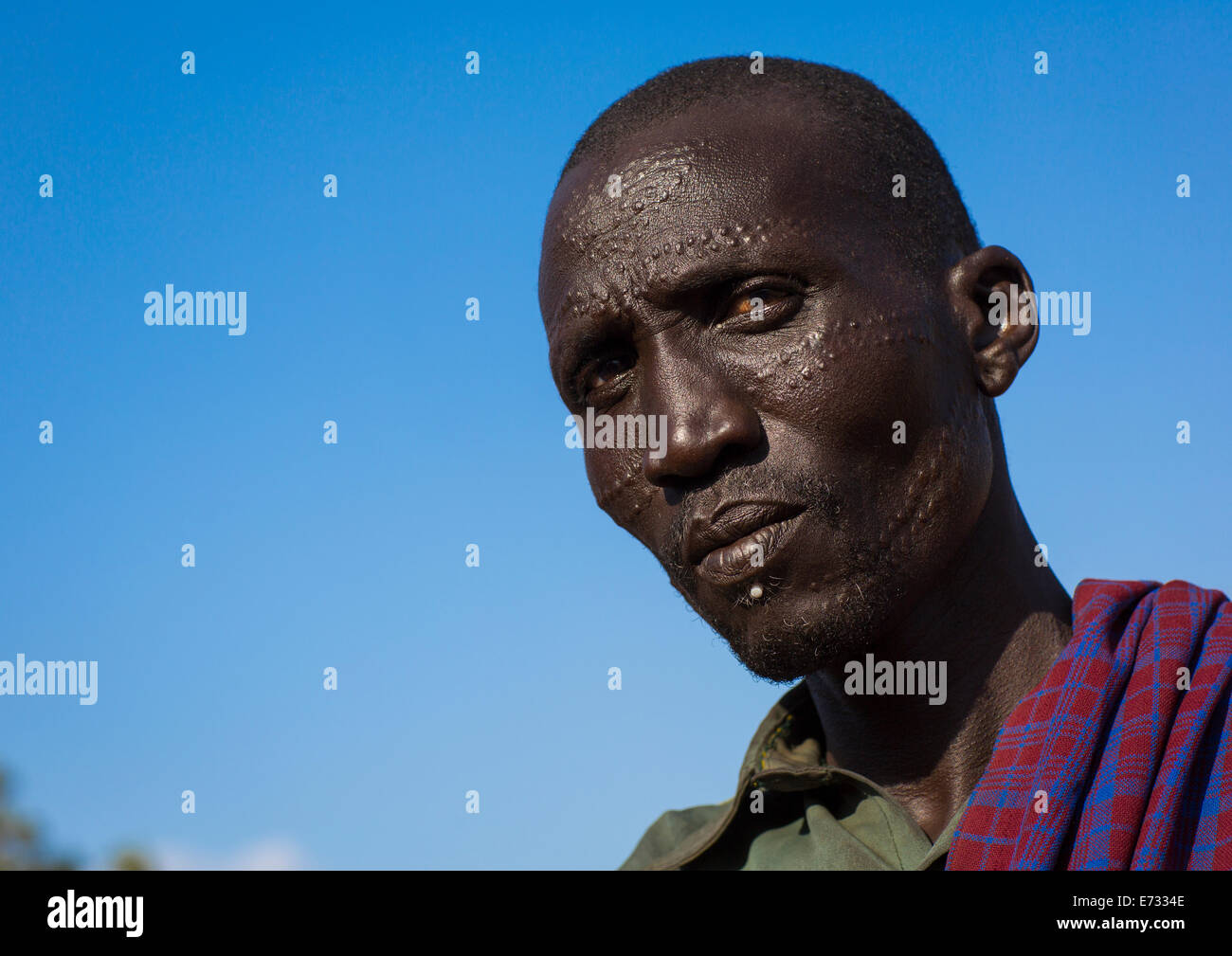 Topossa Tribe Man With Scarifications On His Face, Kangate, Omo Valley ...
