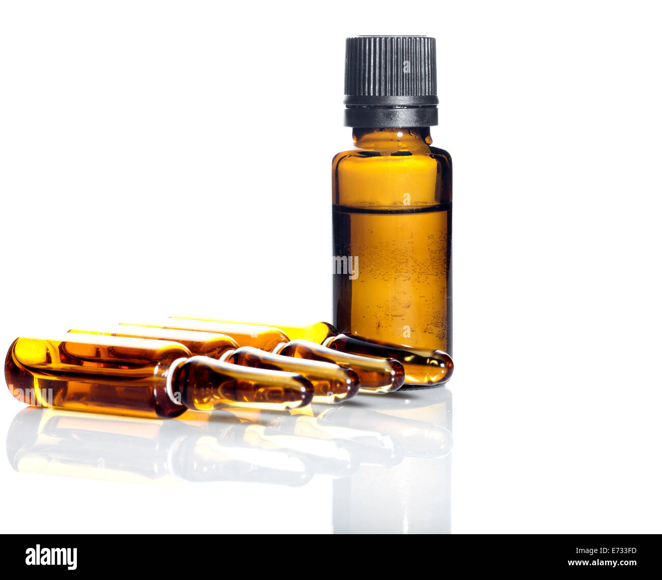 Glass Medicine Vials on a white background Stock Photo - Alamy
