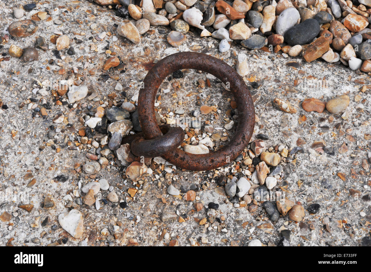 rusty iron ring in concrete Stock Photo - Alamy