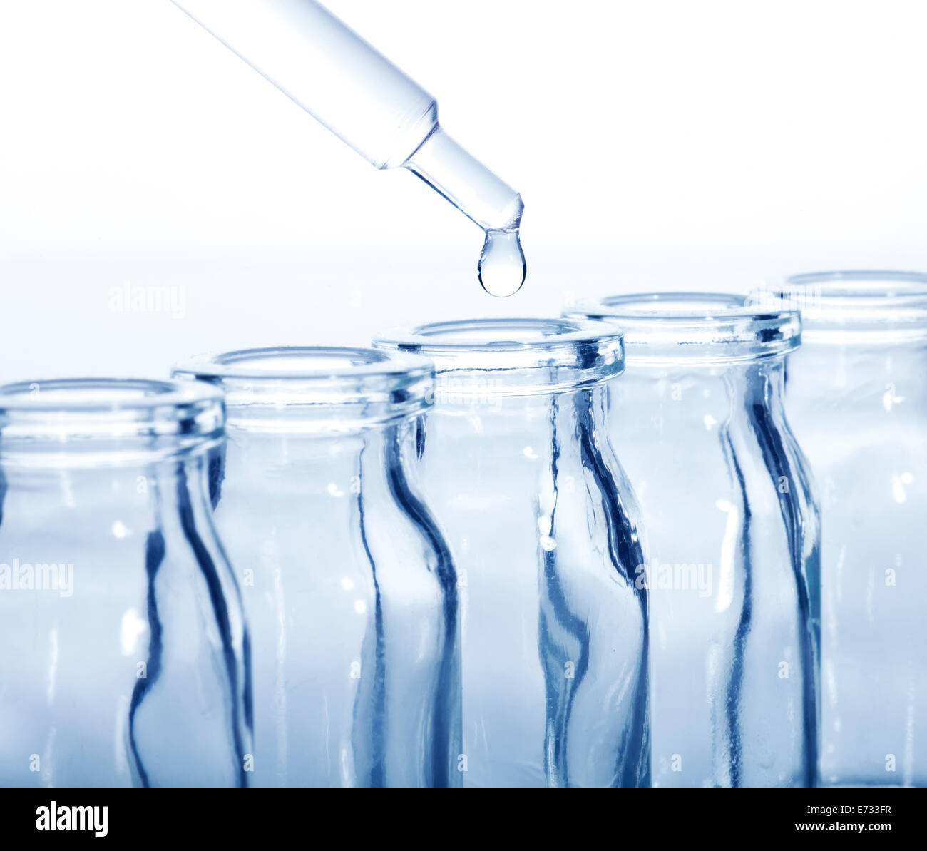 Glass Medicine Vials and dropper on a white background Stock Photo - Alamy