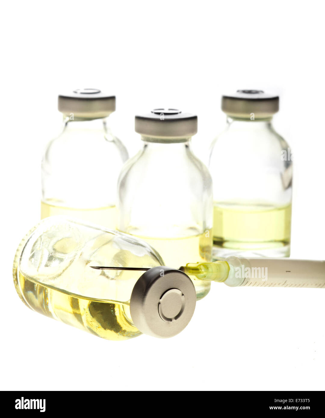 Glass Medicine Vials and Syringe on a white background Stock Photo - Alamy