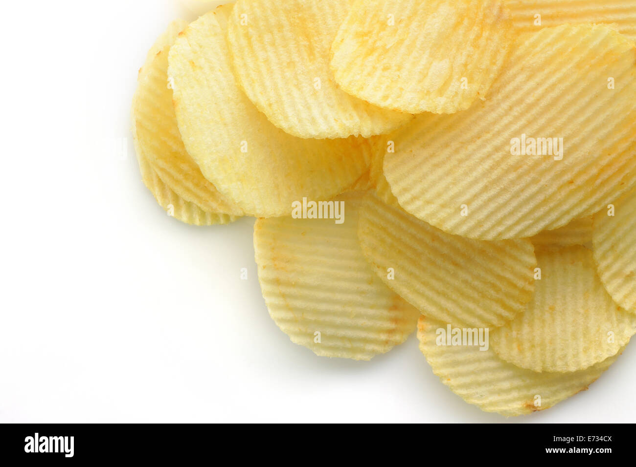 potato chips on white background Stock Photo - Alamy