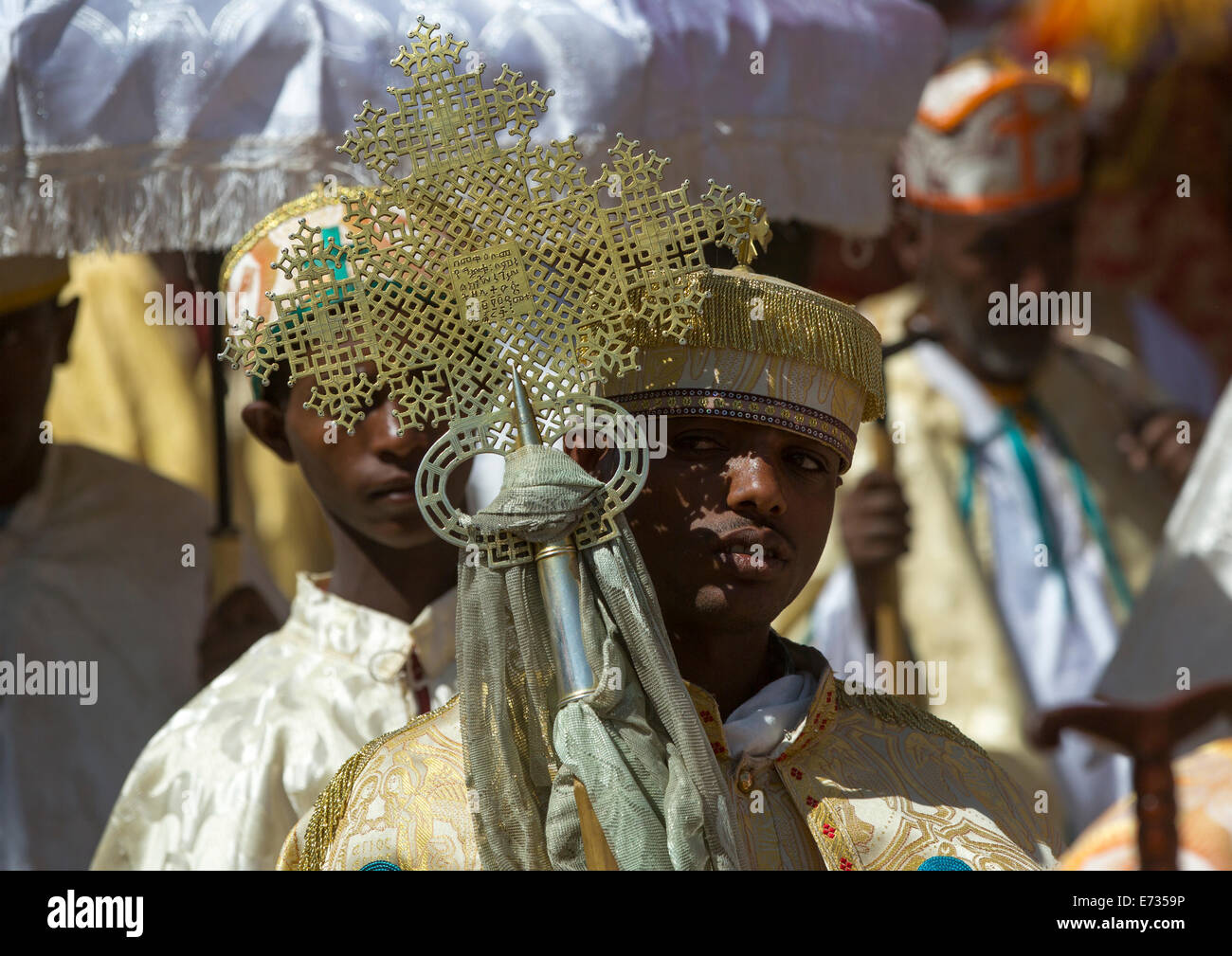 Ethiopian Orthodox Priest Holding A Cross During The Colorful Timkat ...