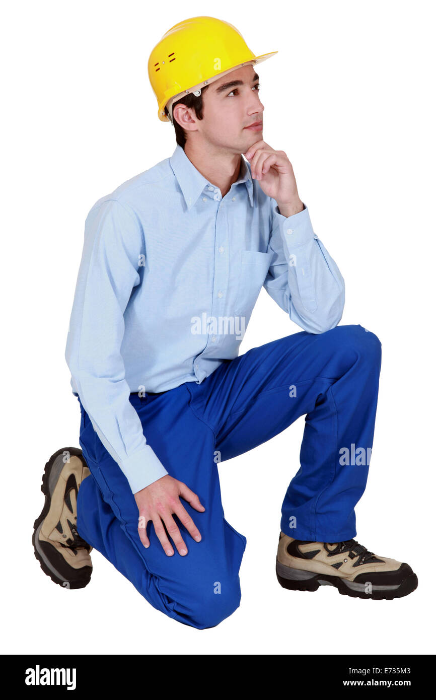A pensive construction worker Stock Photo - Alamy