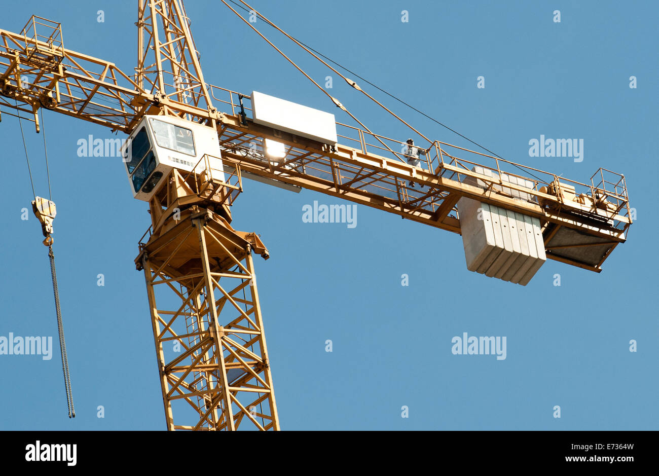 Berlin, Germany. 05th Sep, 2014. A man stands on a building crane in ...
