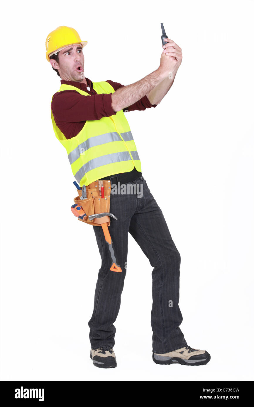 Construction worker shocked Stock Photo - Alamy