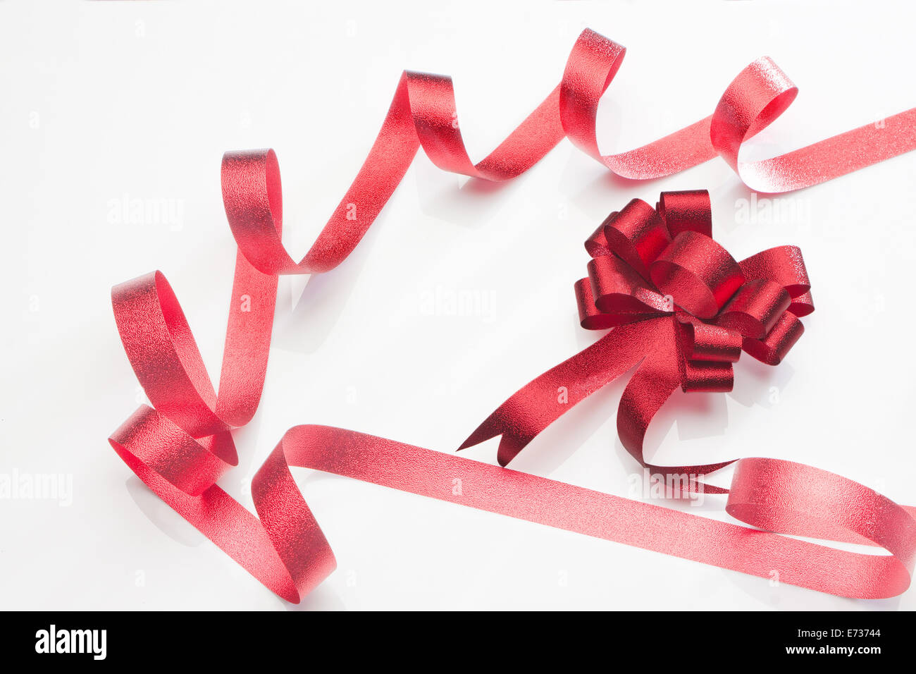 red ribbon isolated on white background Stock Photo - Alamy