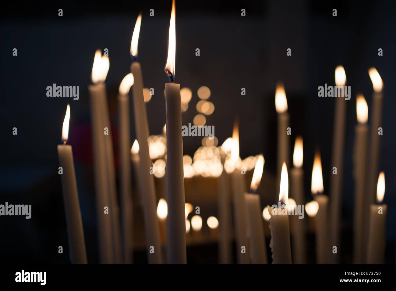 Many lit candles in a Christian Greek church Stock Photo - Alamy