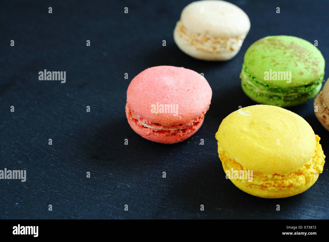 macaroon on the dark background, food closeup Stock Photo - Alamy