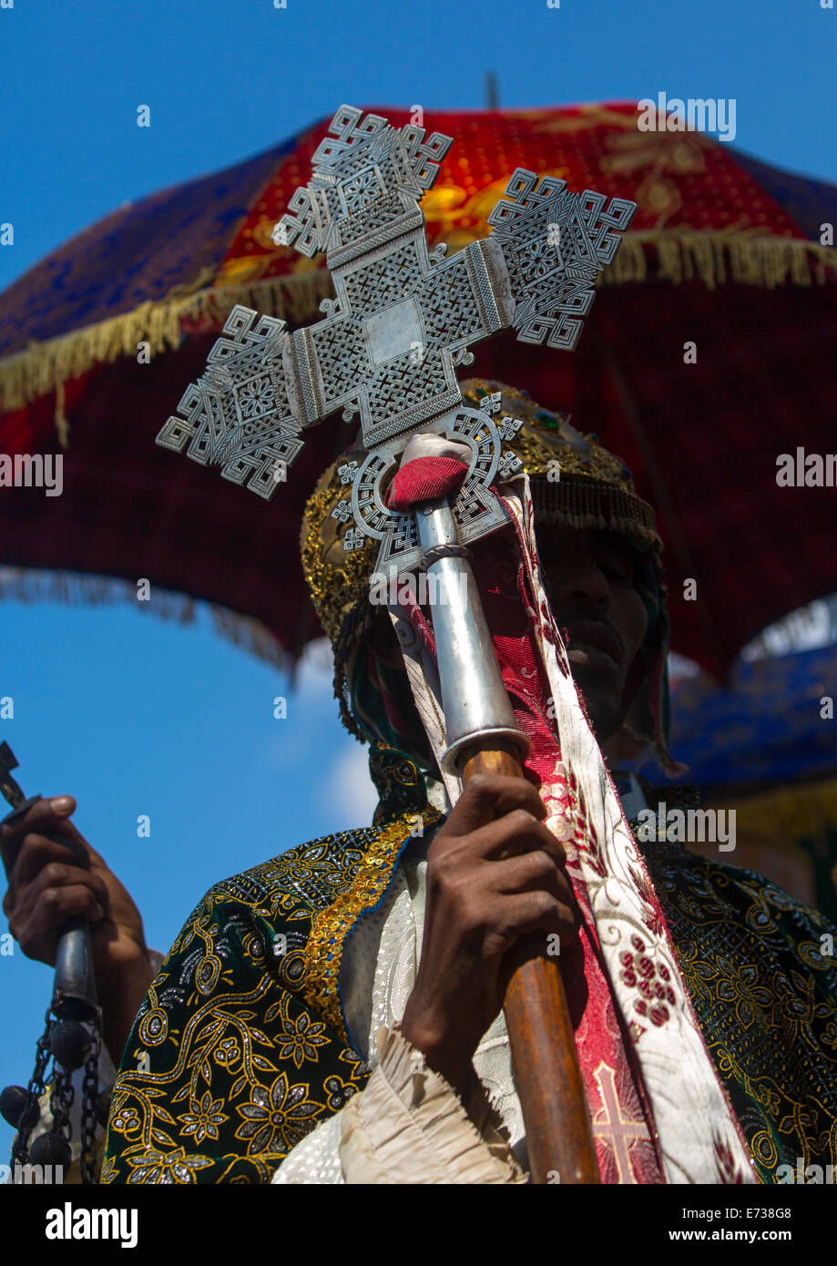 Ethiopian Orthodox Priest Holding A Cross During The Colorful Timkat ...