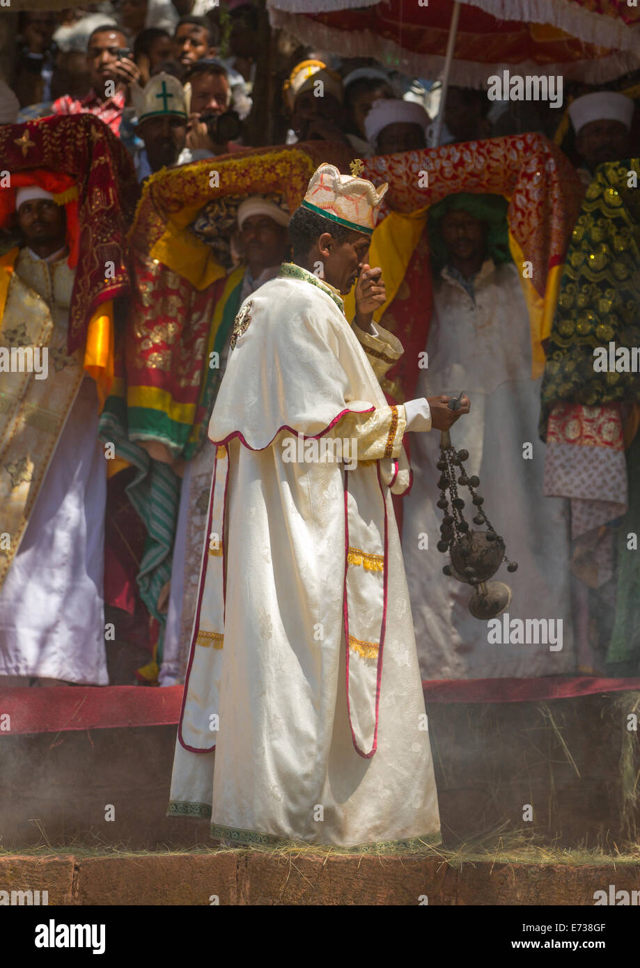 Ethiopian Orthodox Priest Spreadinf Insence During The Colorful Timkat ...