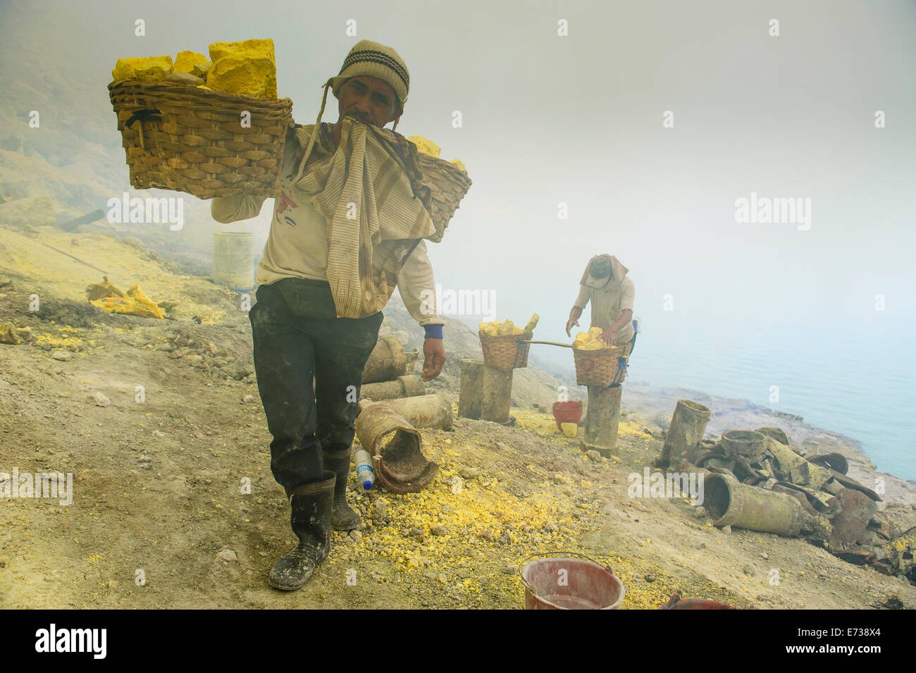 Workers in the sulphur mine of the Ijen Volcano, Java, Indonesia ...