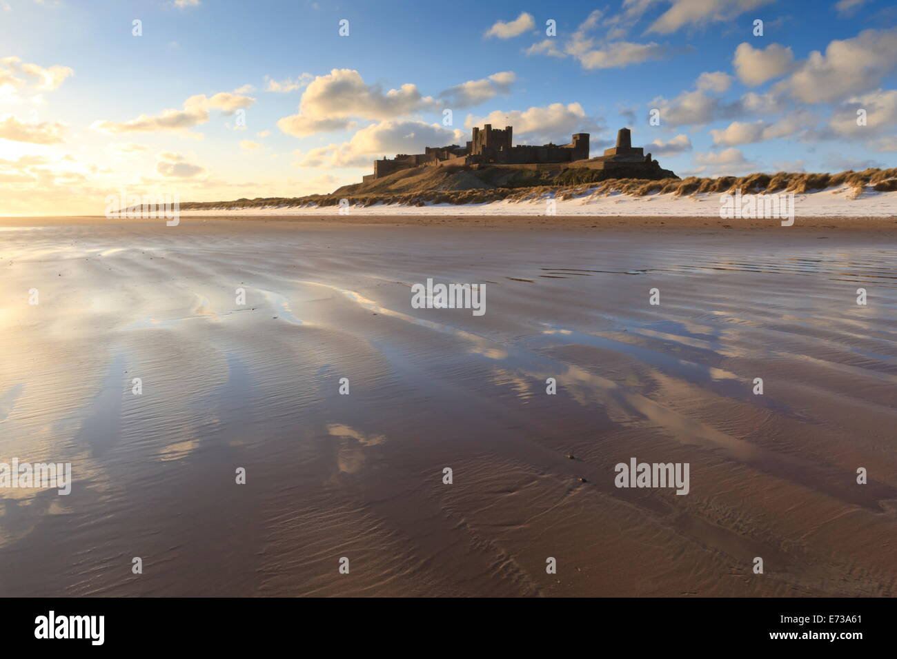 Bamburgh Castle with snow on Bamburgh Beach, Bamburgh, Northumberland ...
