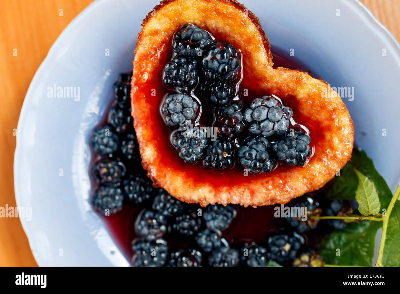 sweet berry omelet with blackberry Stock Photo - Alamy