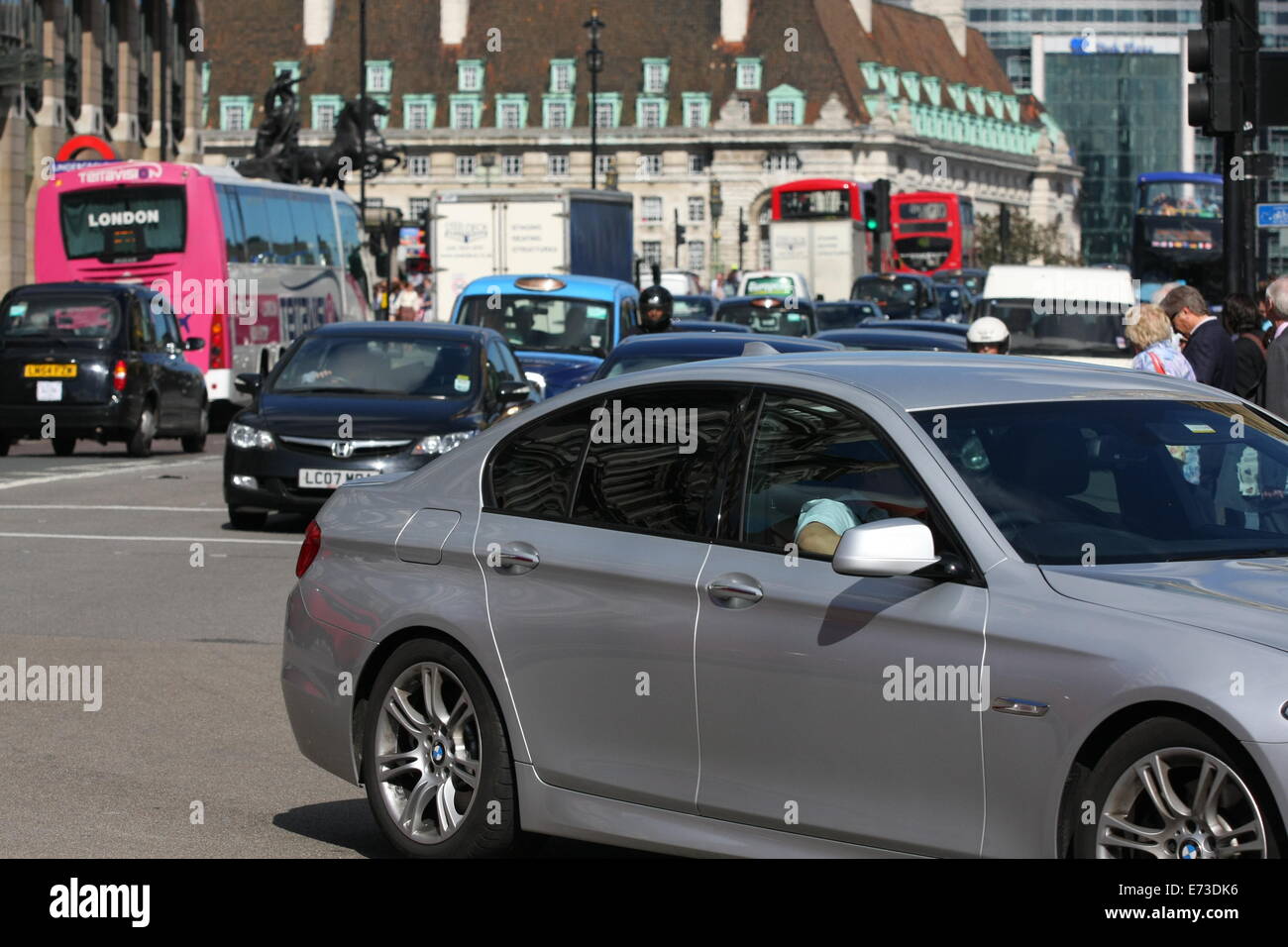 Car turning into side street hi-res stock photography and images - Alamy