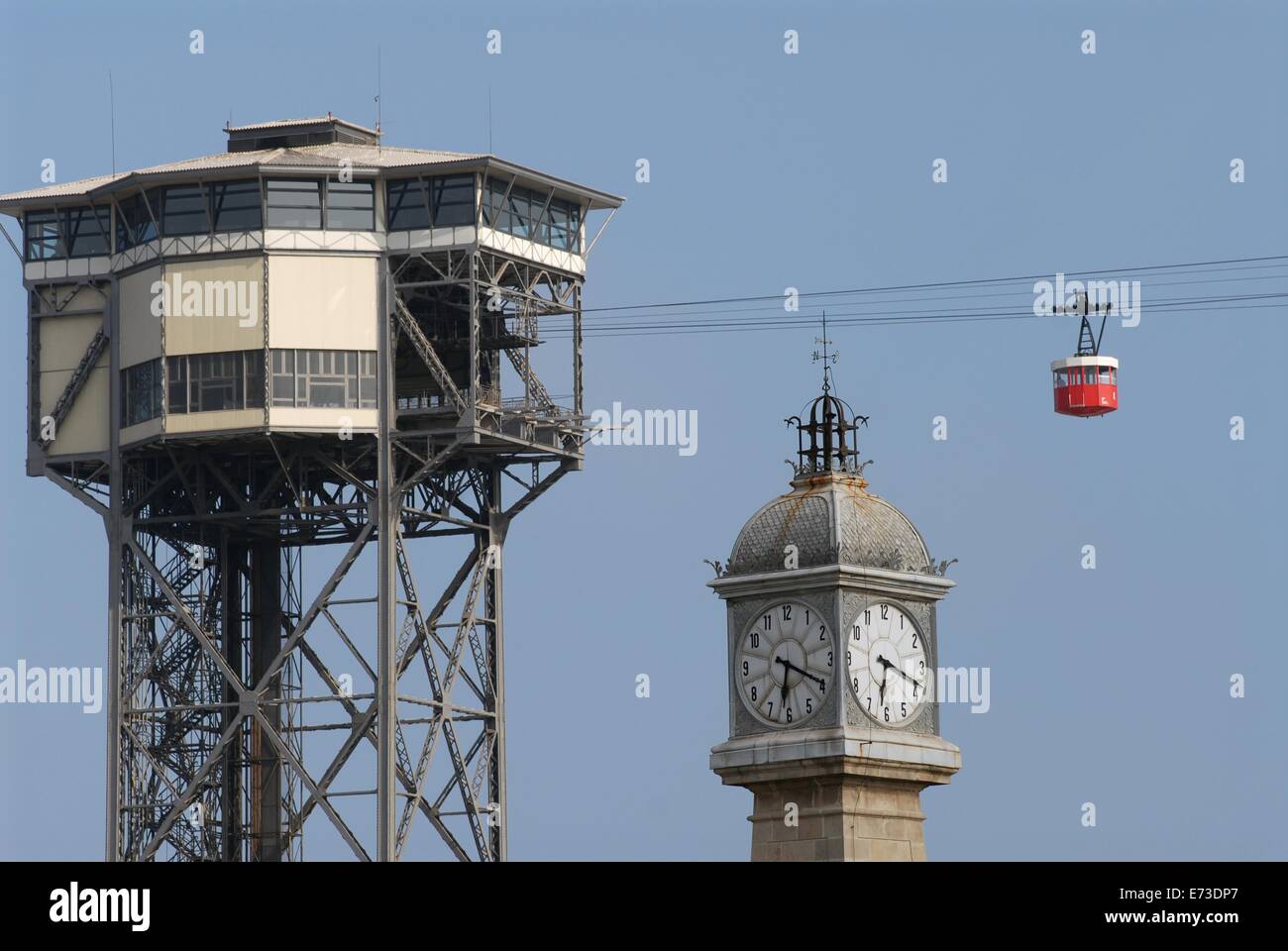 Barcelona, harbour cableway and the Clock Tower Stock Photo - Alamy