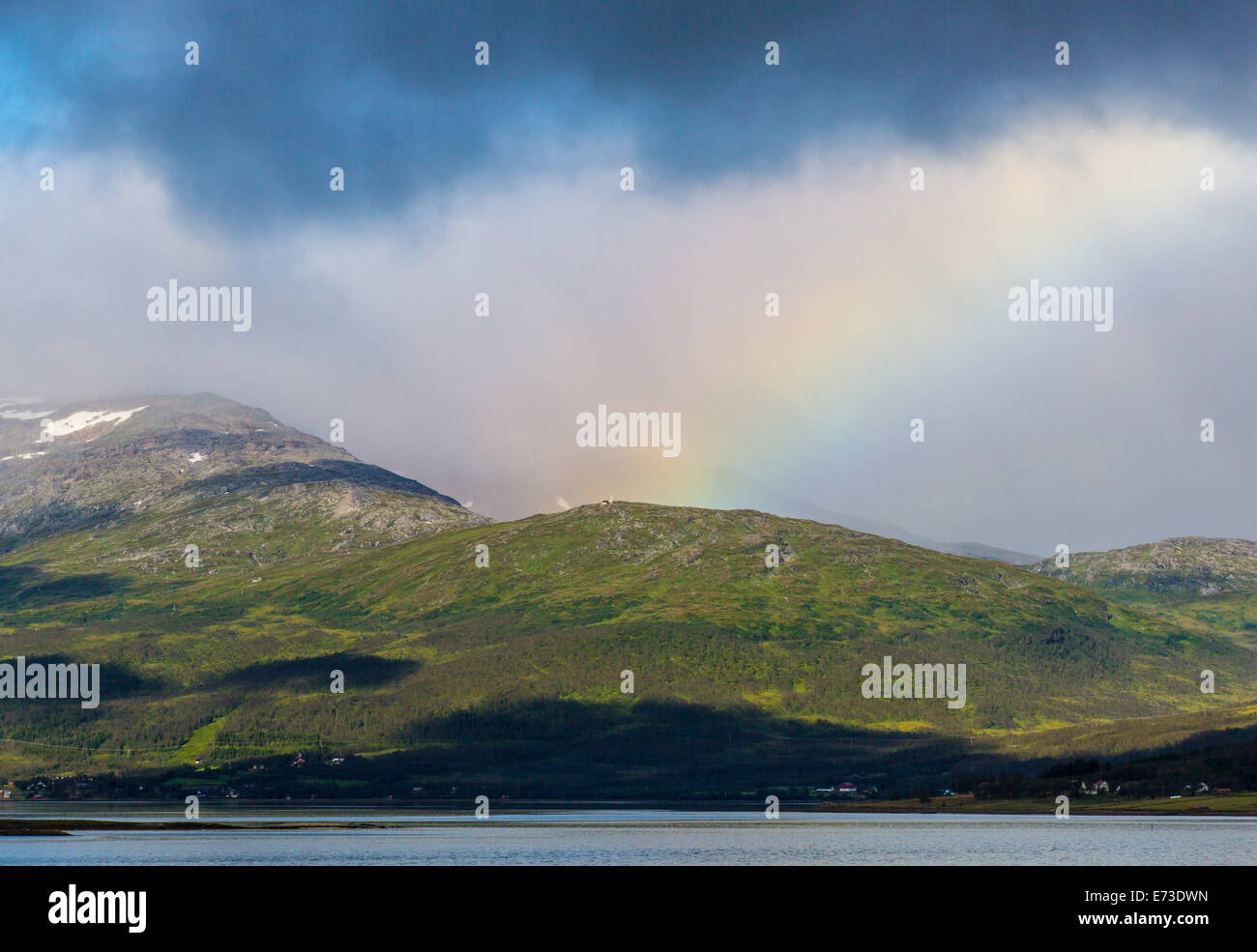 rainbow over island Kvaloya Stock Photo - Alamy