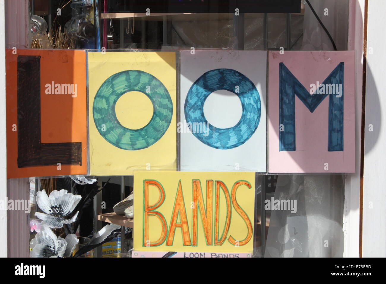 loom bands sign notice in shop window in wales great britain uk Stock ...