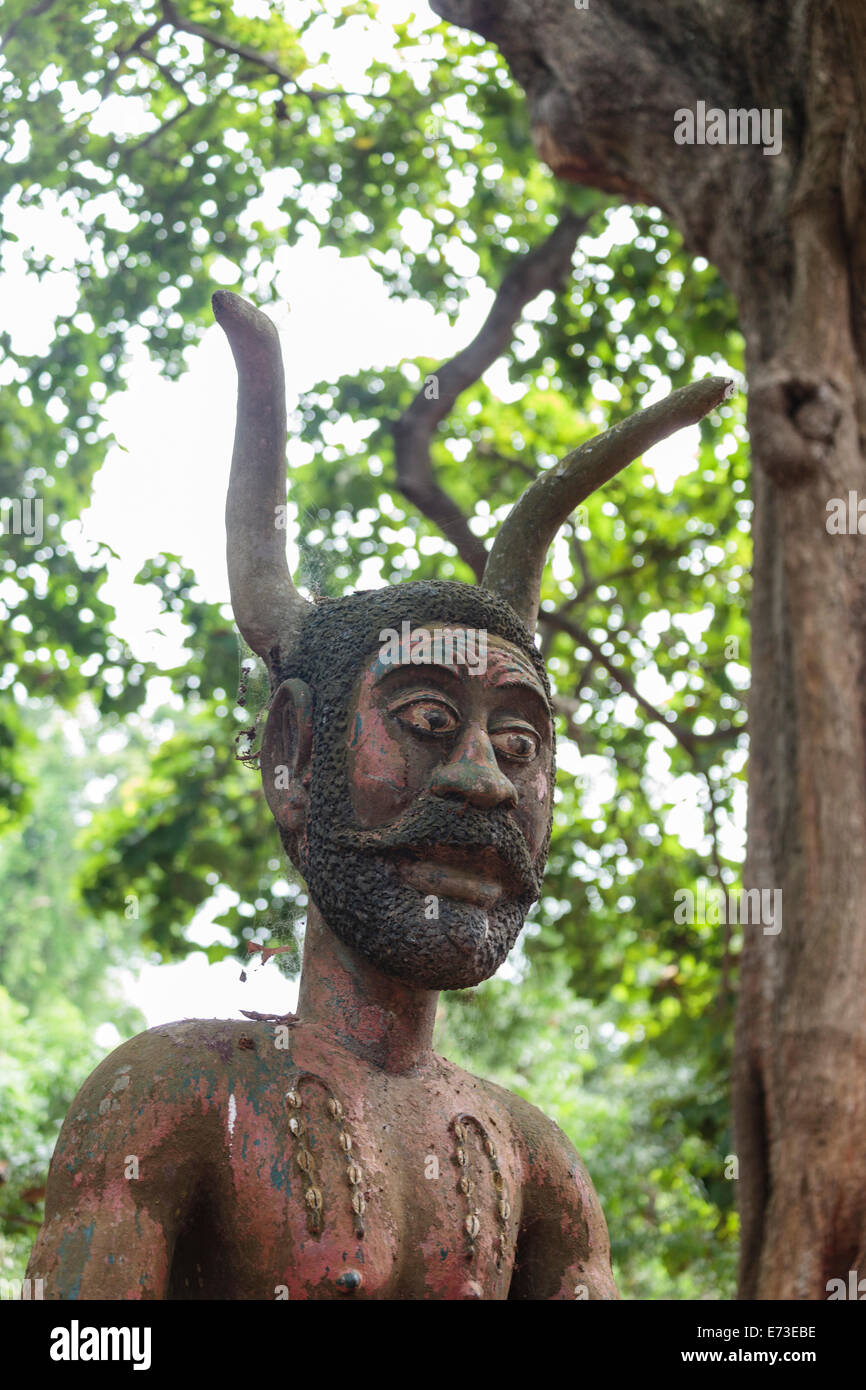 Africa, Benin, Ouidah. Close-up of horned deity figure in Kpasse Sacred ...
