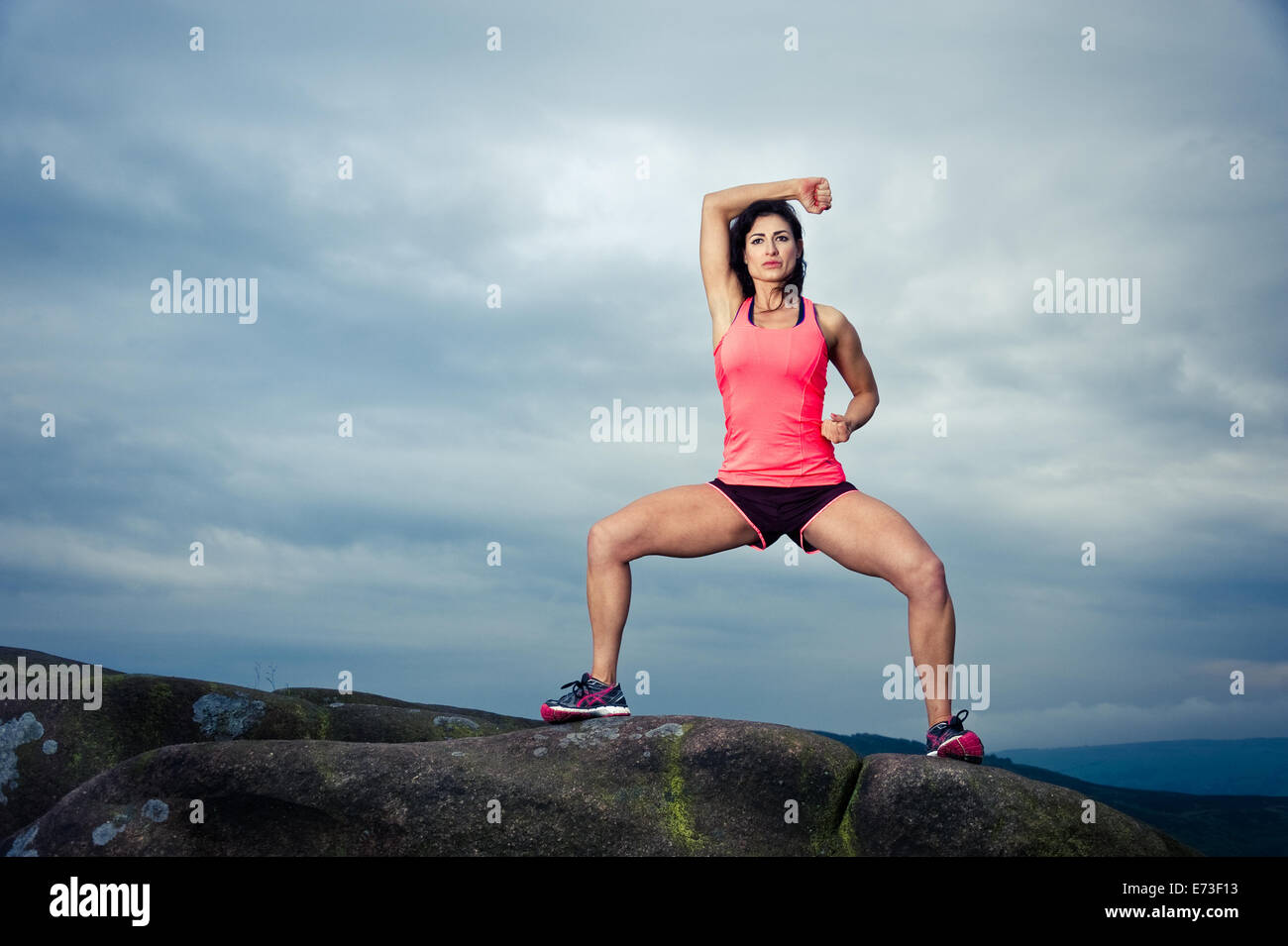 Woman athlete practicing exercise hi-res stock photography and images ...