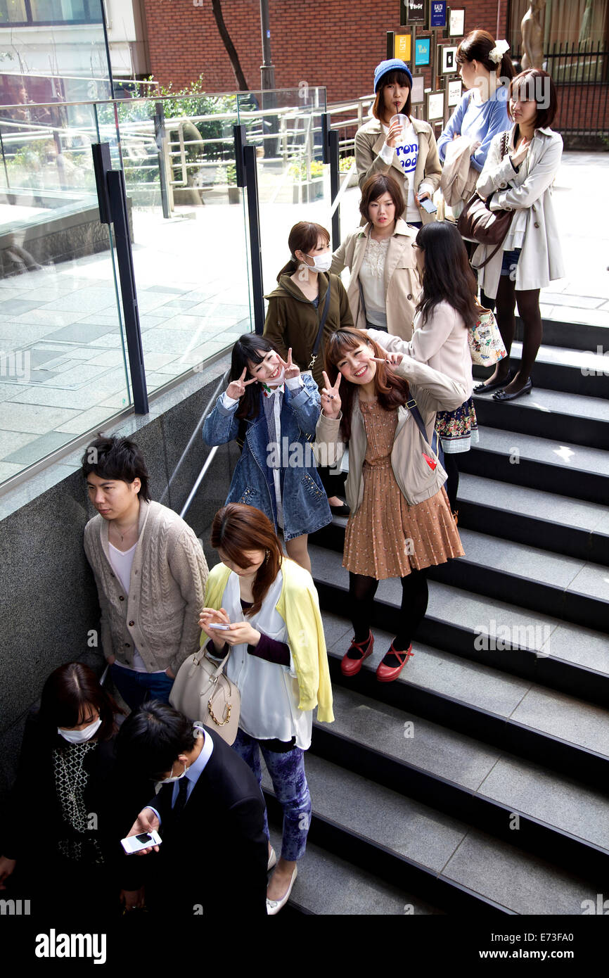 Young people, women, girls, men waiting in line for shopping in fashion ...
