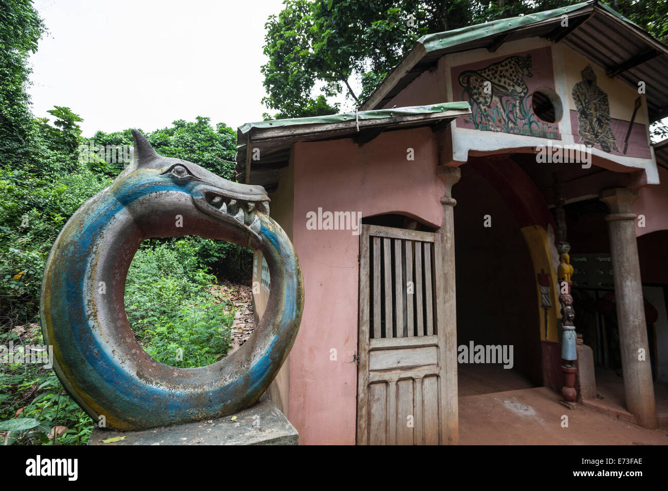 Africa, Benin, Ouidah. Aido Hwedo, the rainbow serpent deity in front ...