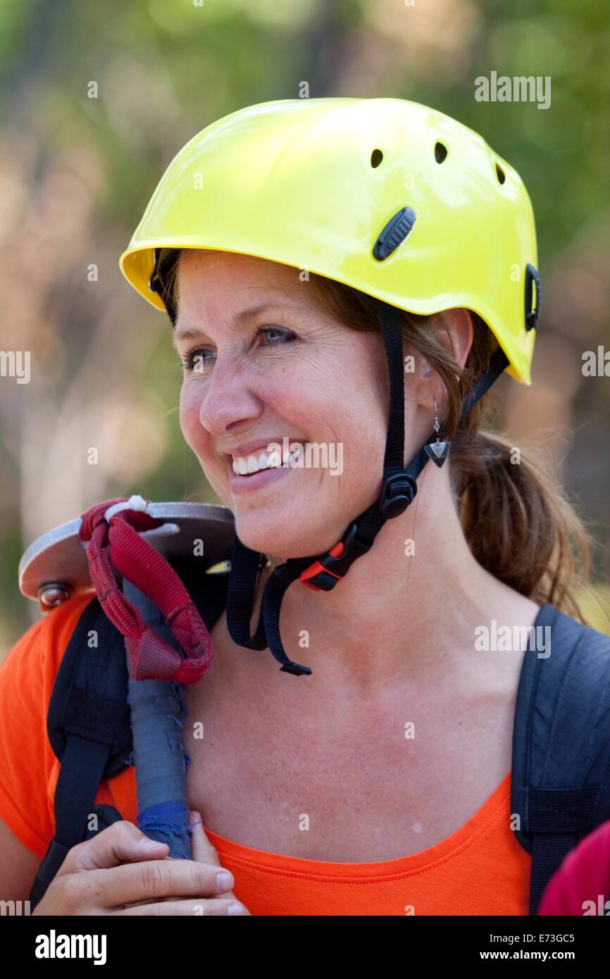 A woman on a zip line tour in Whitefish, Montana Stock Photo - Alamy