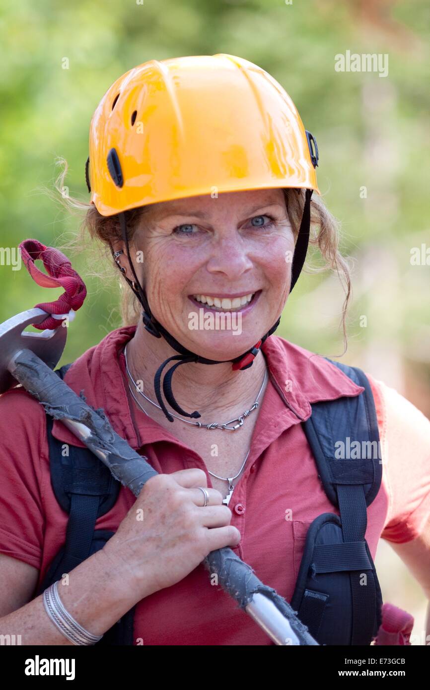 A woman on a zip line tour in Whitefish, Montana Stock Photo - Alamy