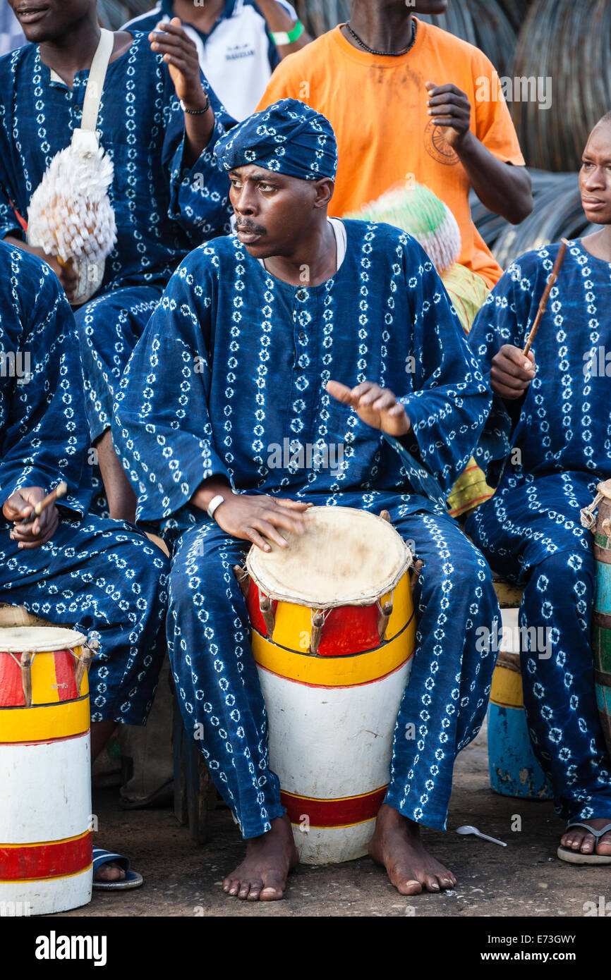 Africa, Benin, Cotonou. Band performing in traditional dress at port ...