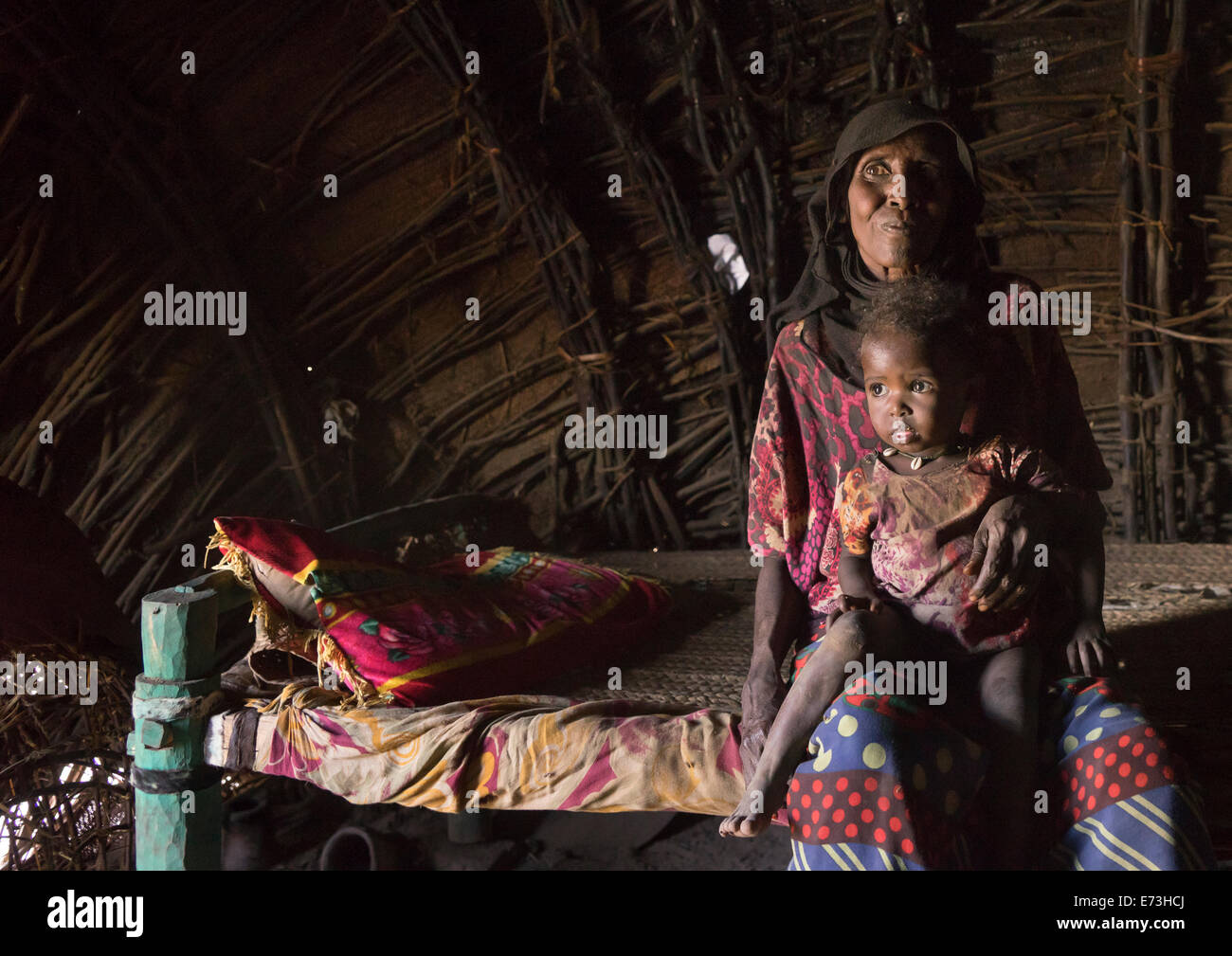 Afar Tribe Mother And Her Daughter Inside Her House, Afambo, Ethiopia ...