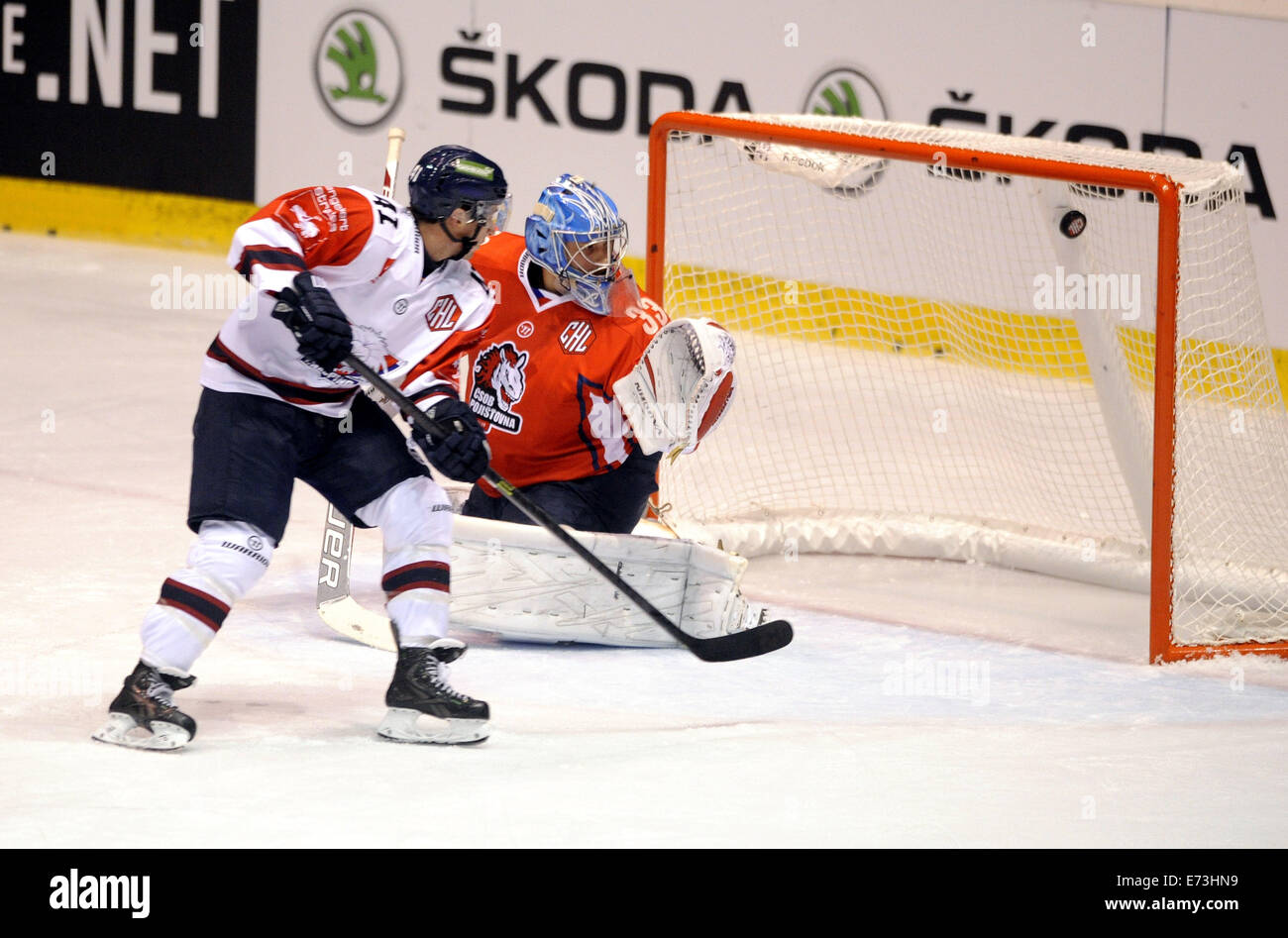 Pardubice goalkeeper Robert Kristan and Broc Little of Linkoping are ...