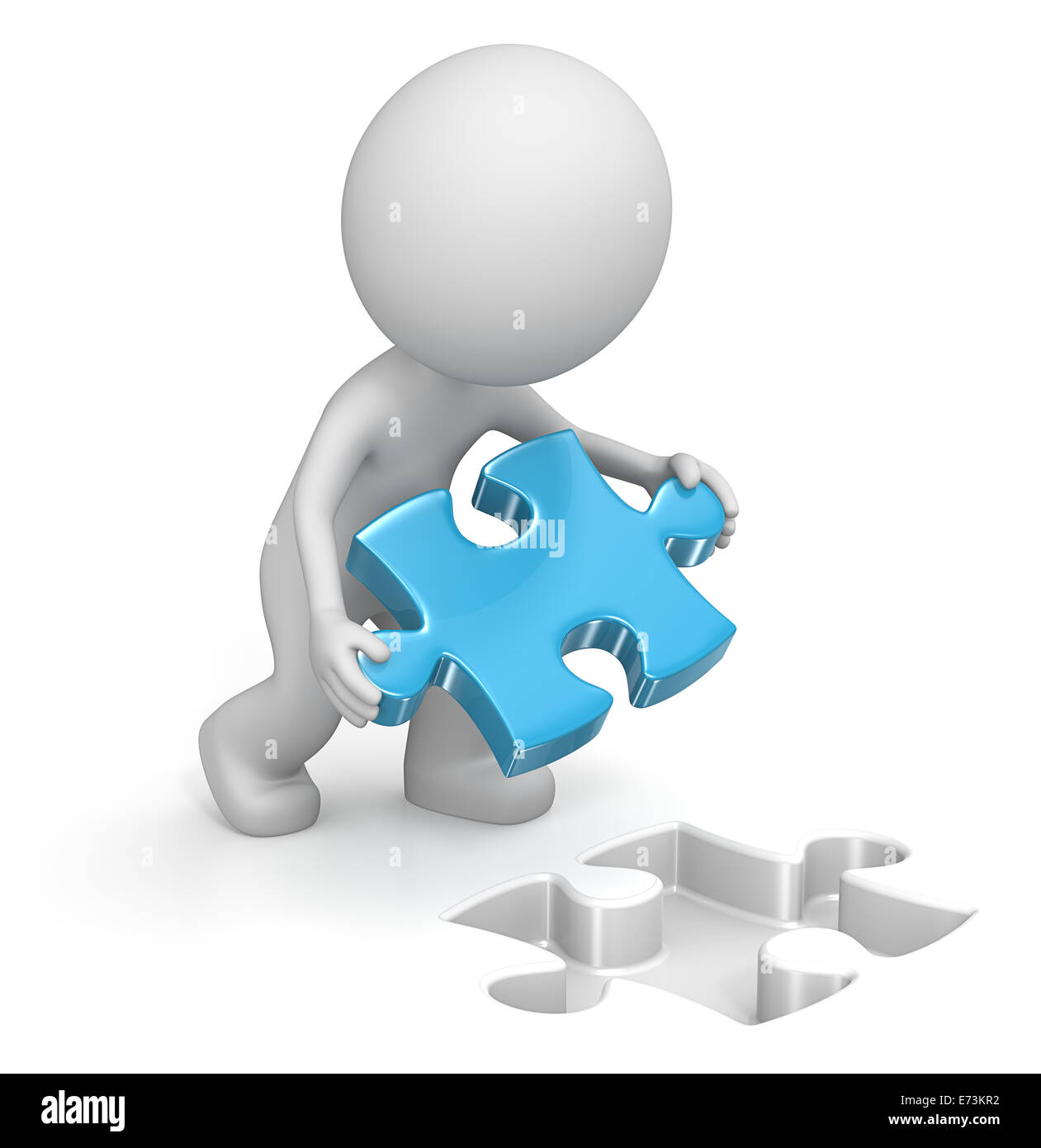 The dude putting blue puzzle piece in place Stock Photo - Alamy