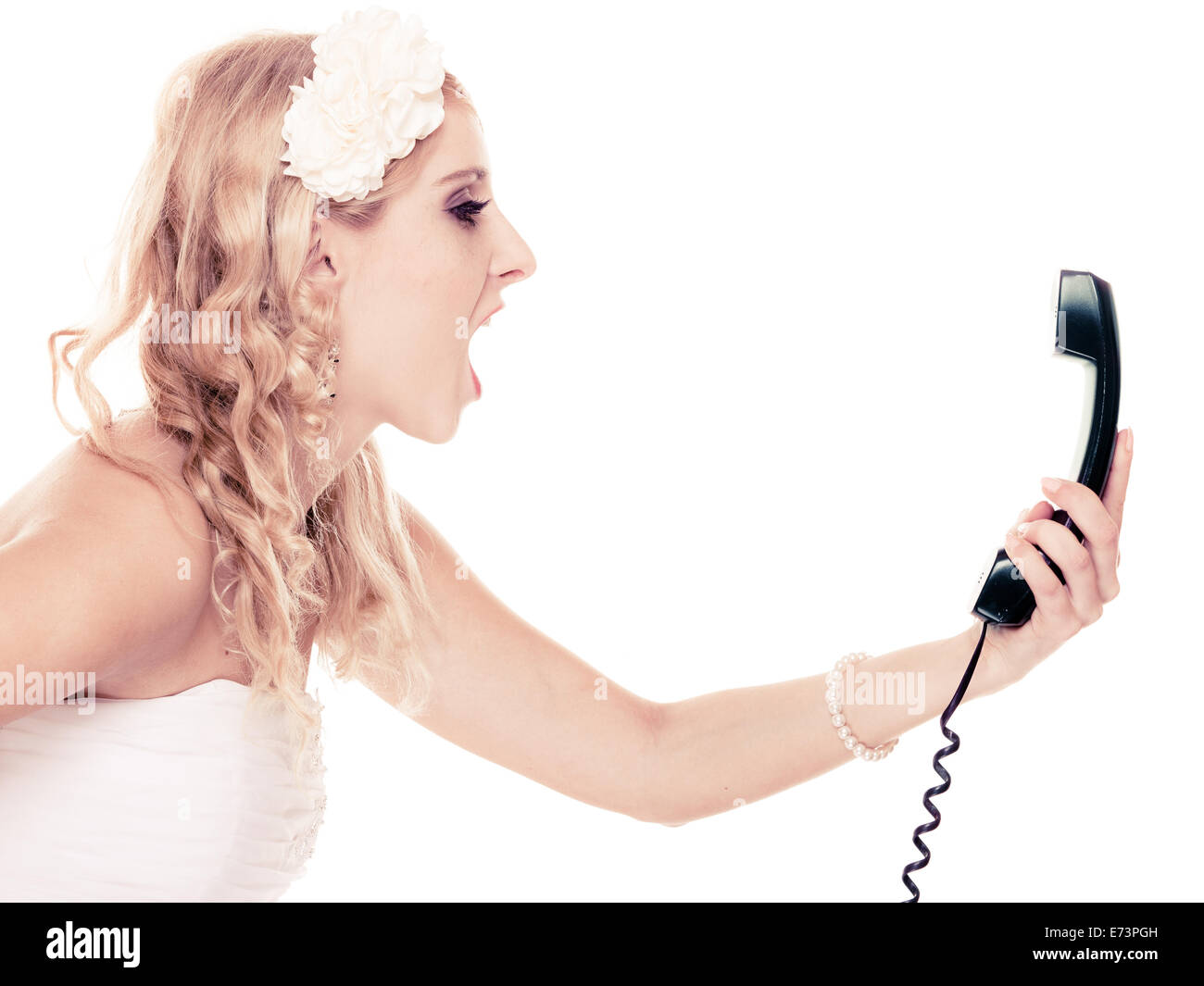 Wedding relationship difficulties. Angry woman talking on the phone ...