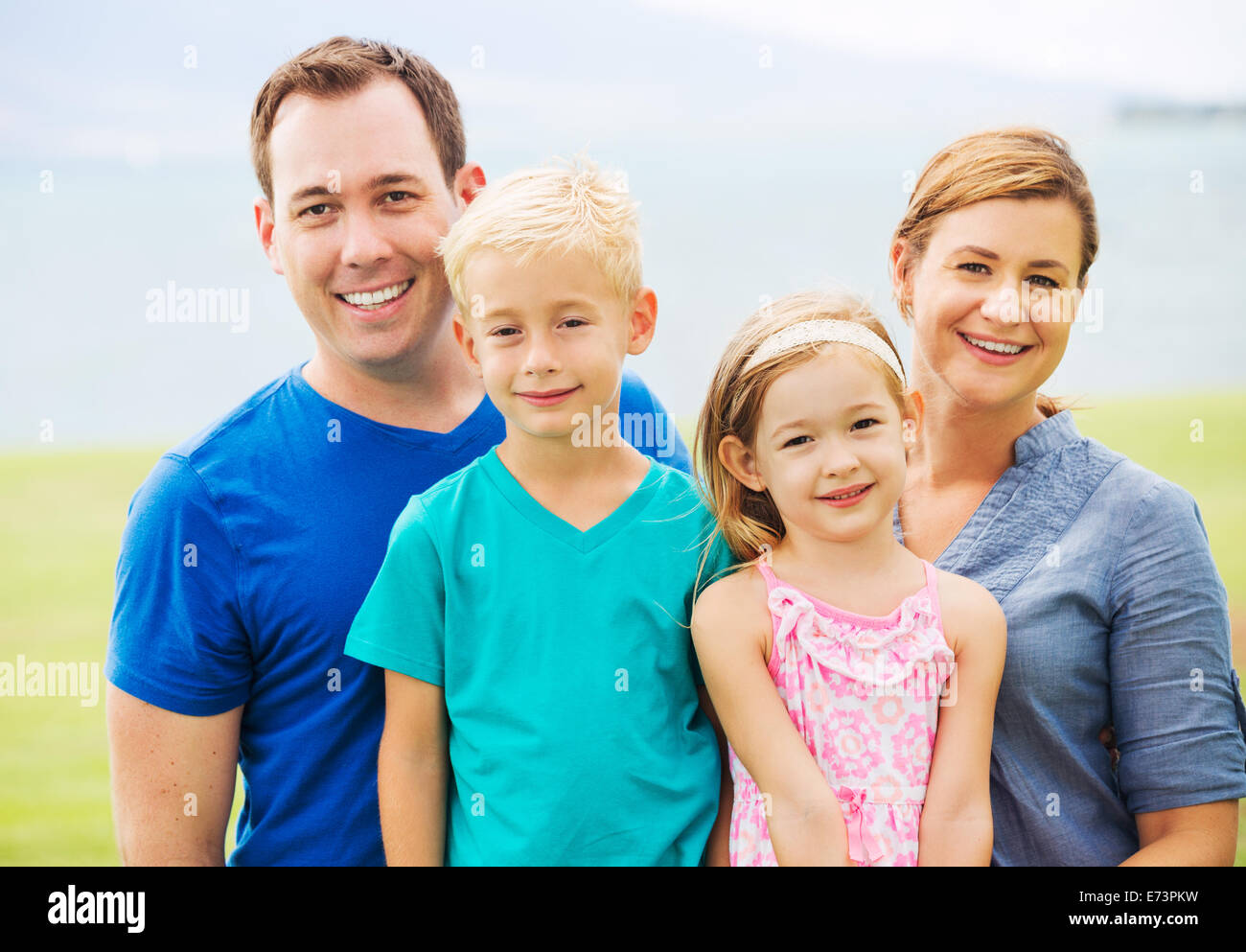 Portrait of Happy Family Outside Stock Photo - Alamy