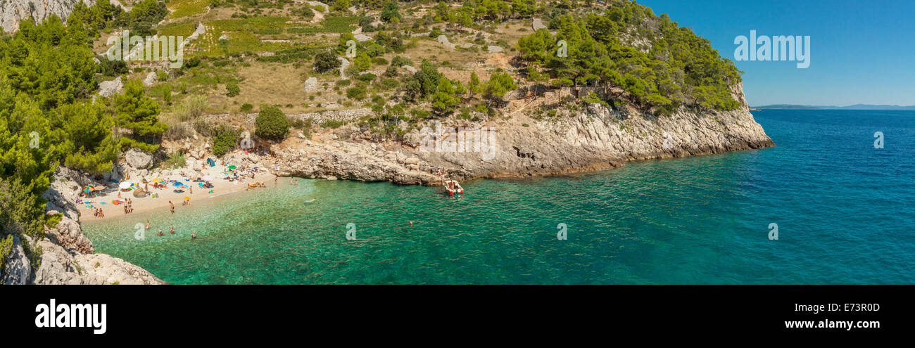 Tourists on Lucisca beach near Sveta Nedilja village, Hvar island ...