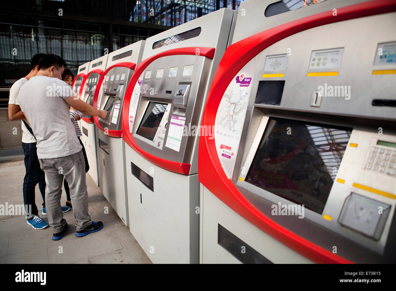 Spain, Madrid, Self-service ticket machines at Principe Pio metro ...