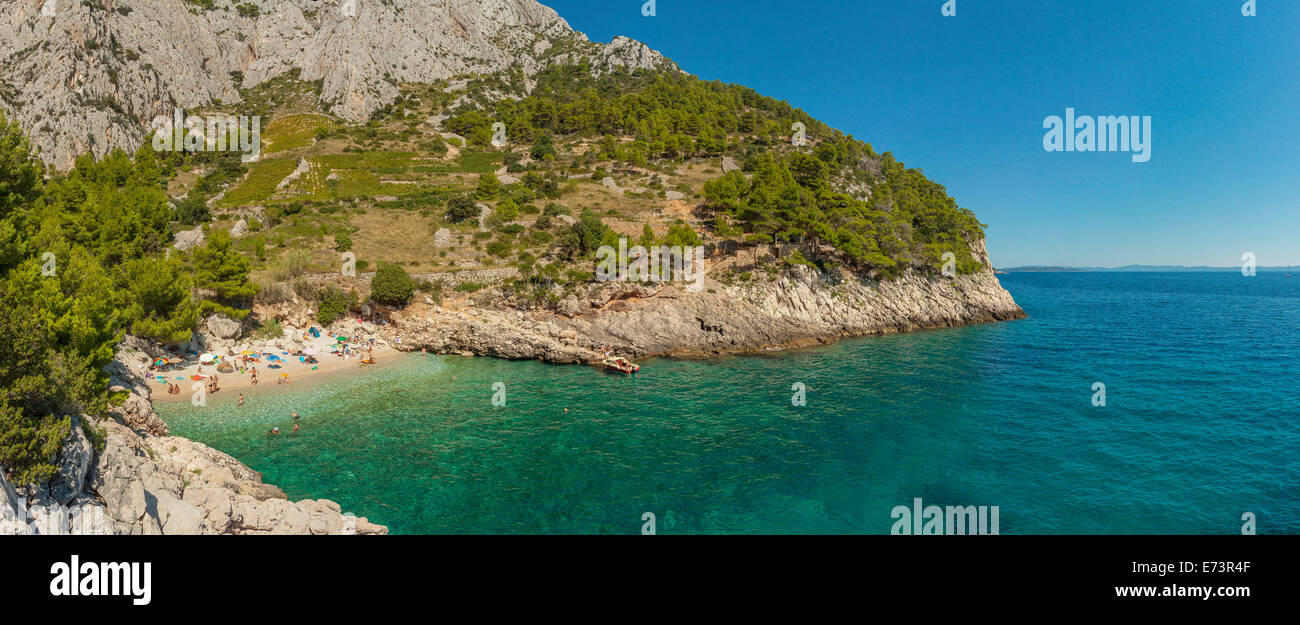 Tourists on Lucisca beach near Sveta Nedilja village, Hvar island ...