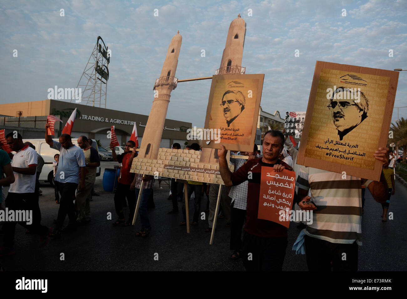 Bahraini citizens raise image of the historic mosque, signifying that ...